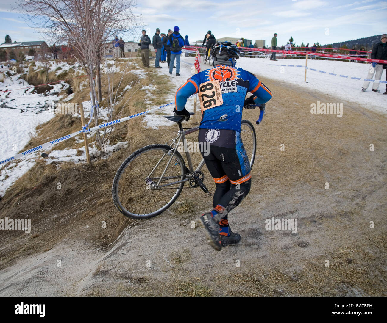 Cross racers on bicycles take part in the USA Cyclocross National ...
