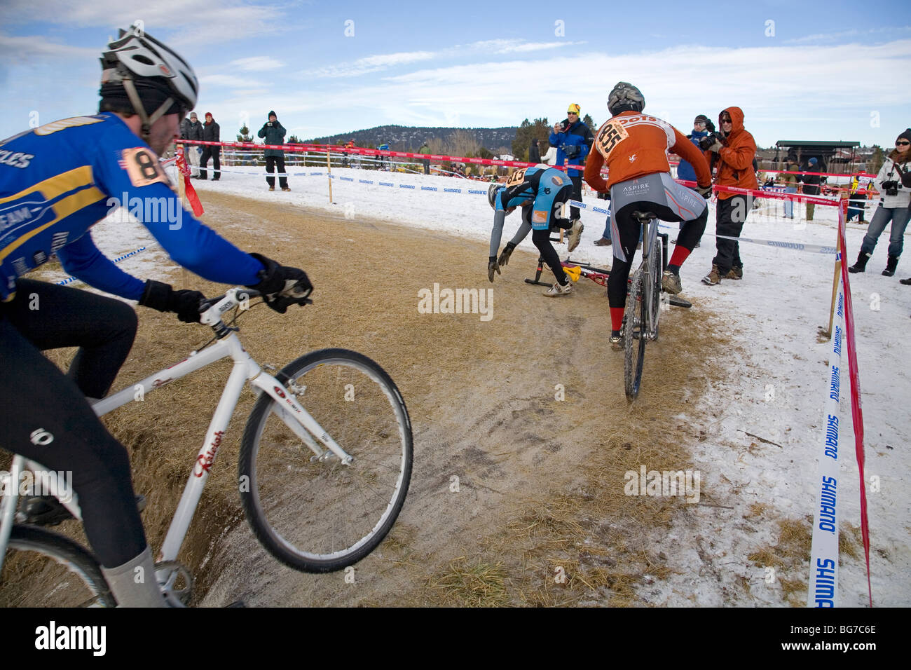 Cross racers on bicycles take part in the USA Cyclocross National ...