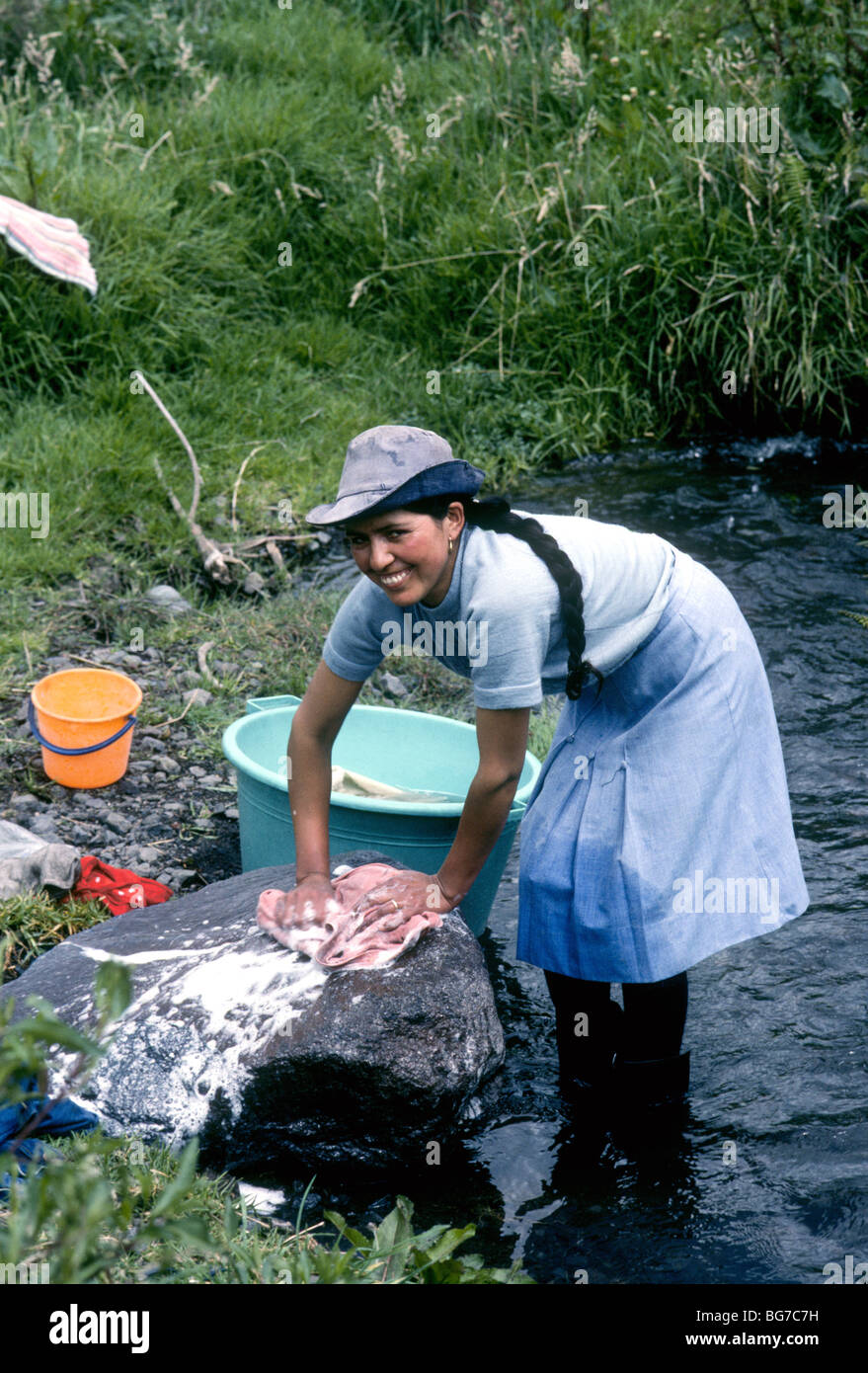 Woman is washing laundry in stream hi-res stock photography and images ...