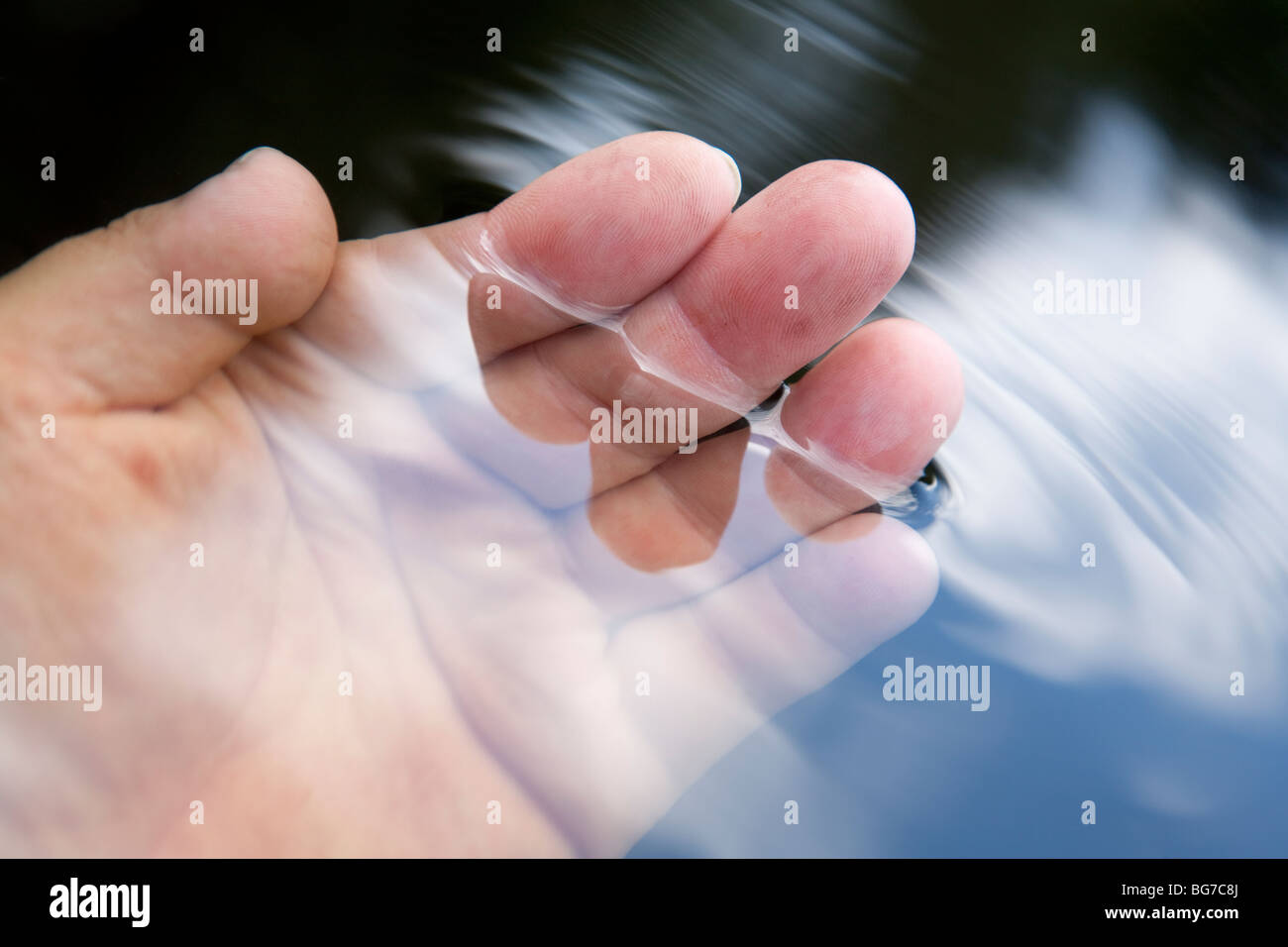 Hand reaching underwater hi-res stock photography and images - Alamy