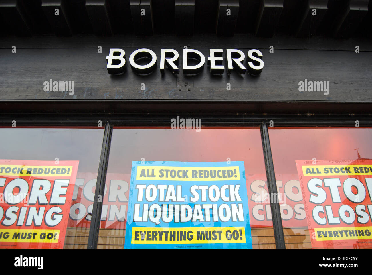 total stock liquidation and store closing signs at a branch of borders ...