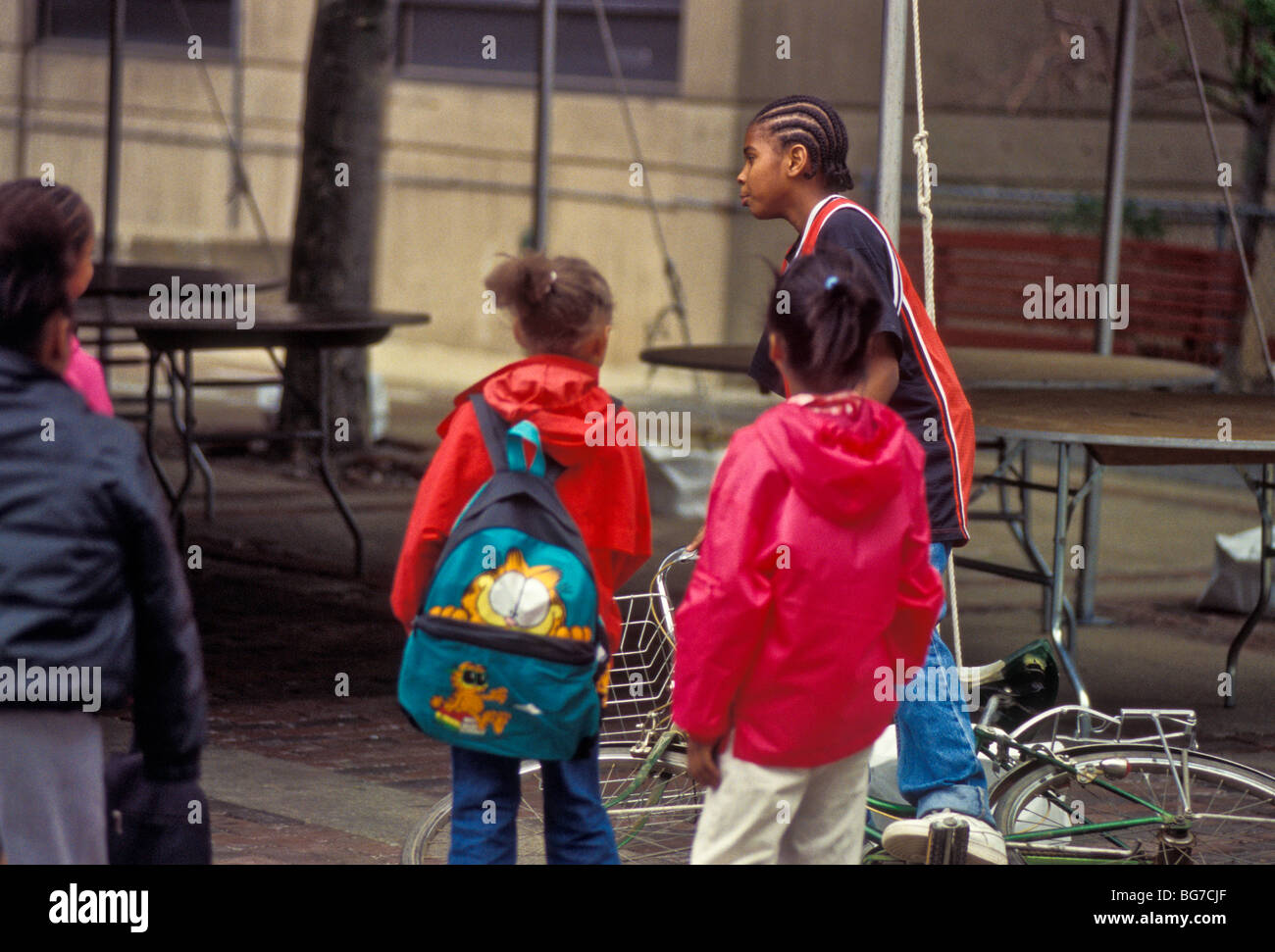 Group of children on playground colorful clothes Stock Photo - Alamy