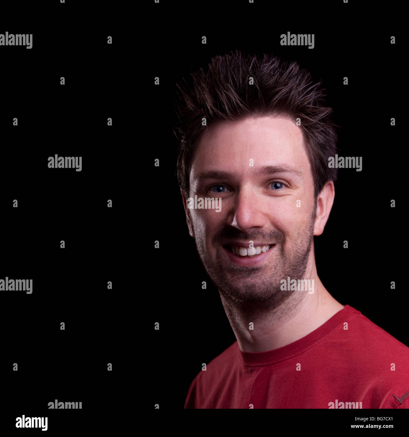 A smiling male staring at the camera Stock Photo - Alamy