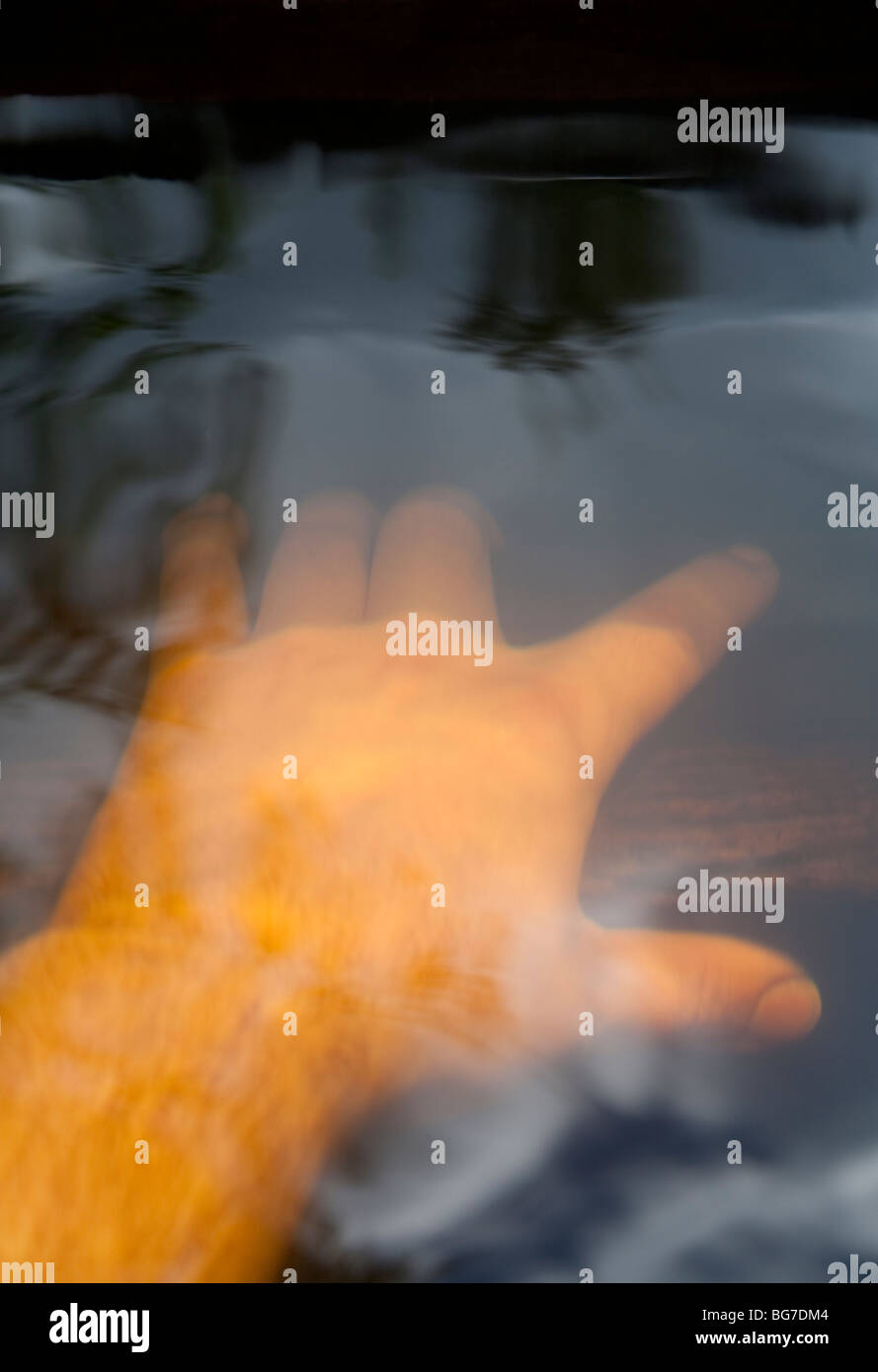 Hand reaching underwater hi-res stock photography and images - Alamy