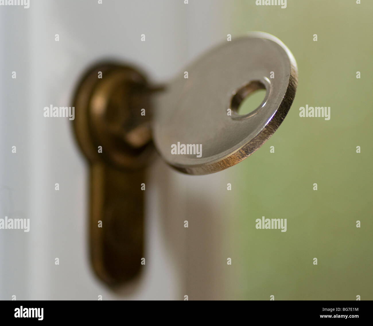 Key in lock Stock Photo - Alamy