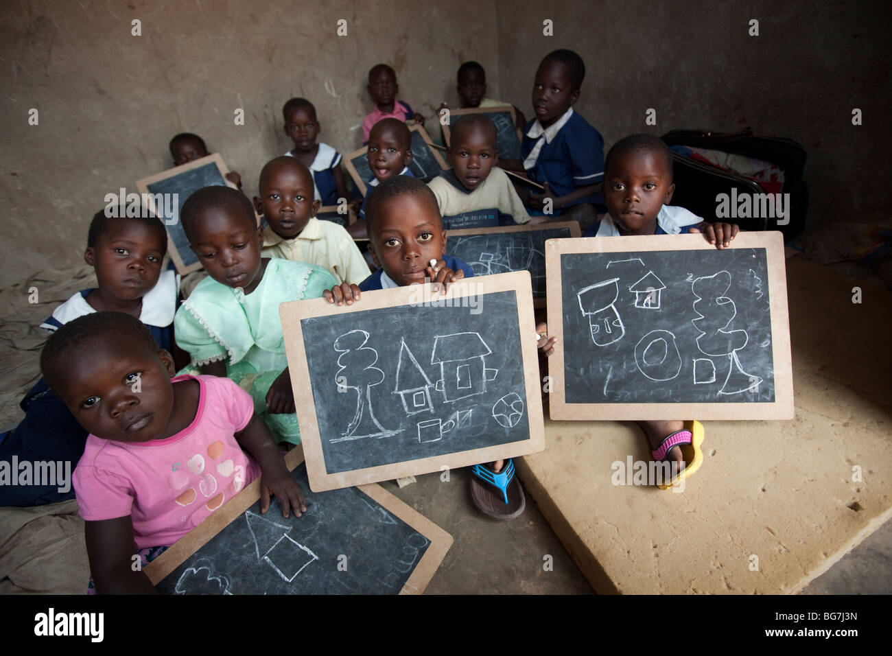 African child drawing tree hi-res stock photography and images - Alamy