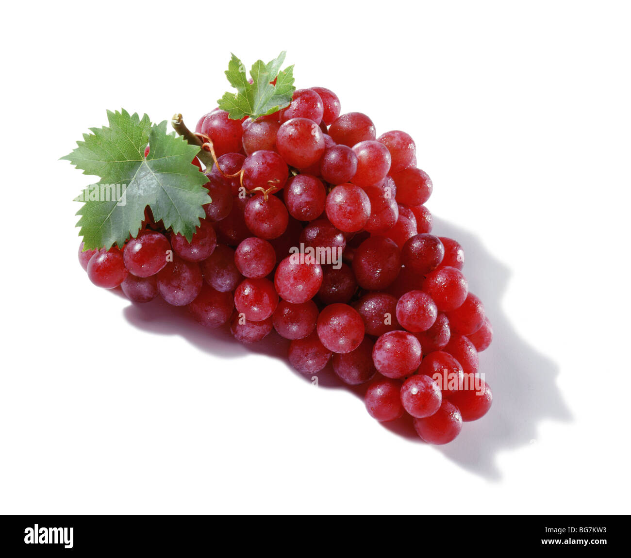 Bunch of red grapes on white Stock Photo - Alamy