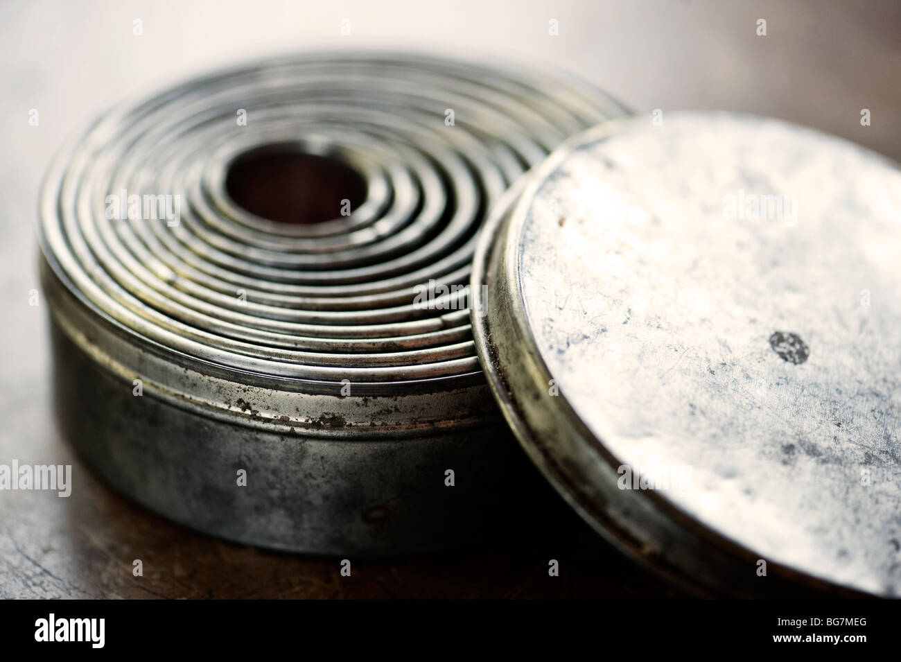 Nested metal kitchen tins and lid Stock Photo - Alamy