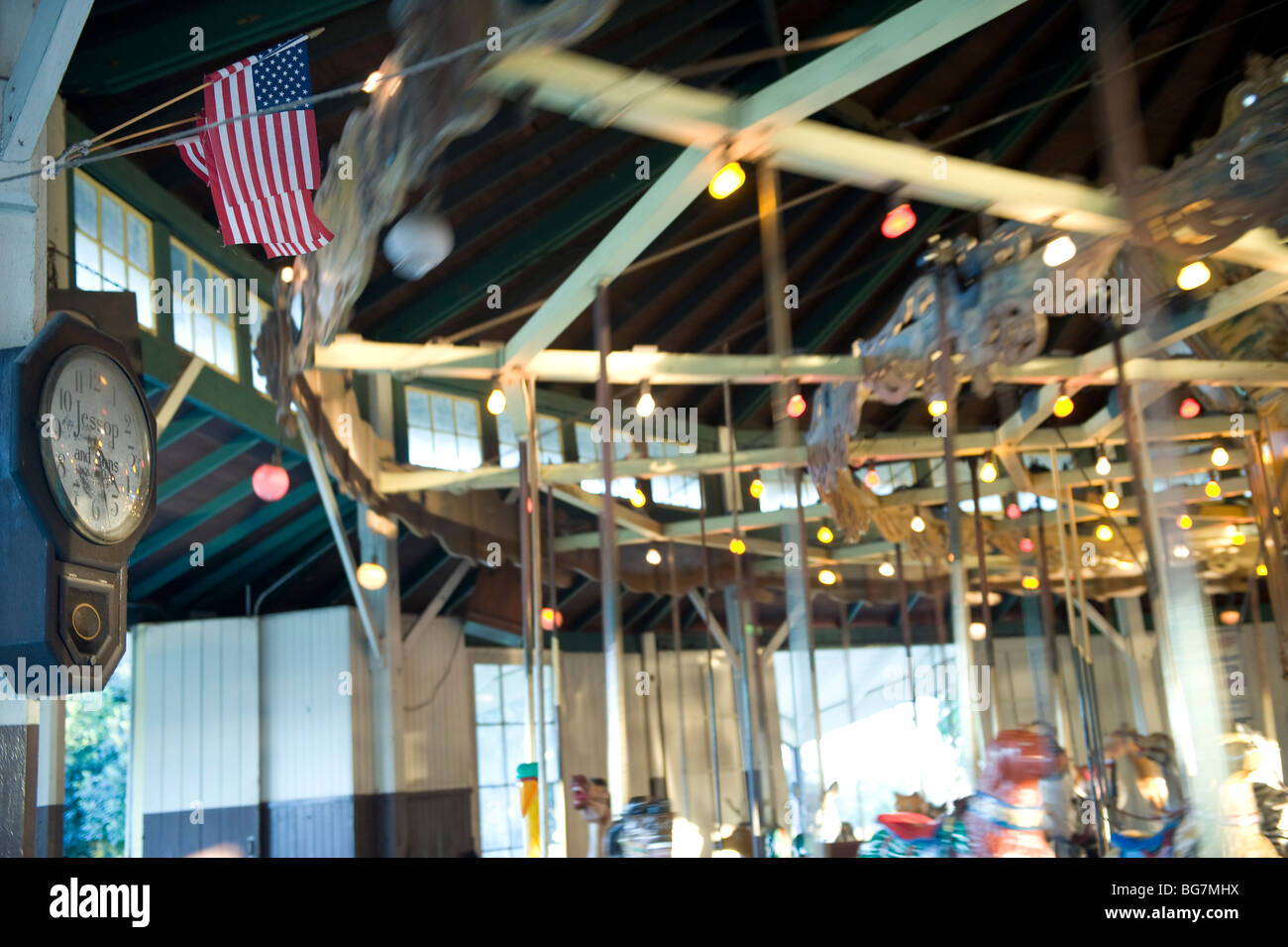 Children riding a beautiful carousel Stock Photo - Alamy