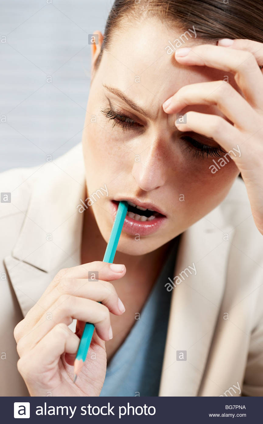 Pencil In Mouth Stock Photos & Pencil In Mouth Stock Images - Alamy