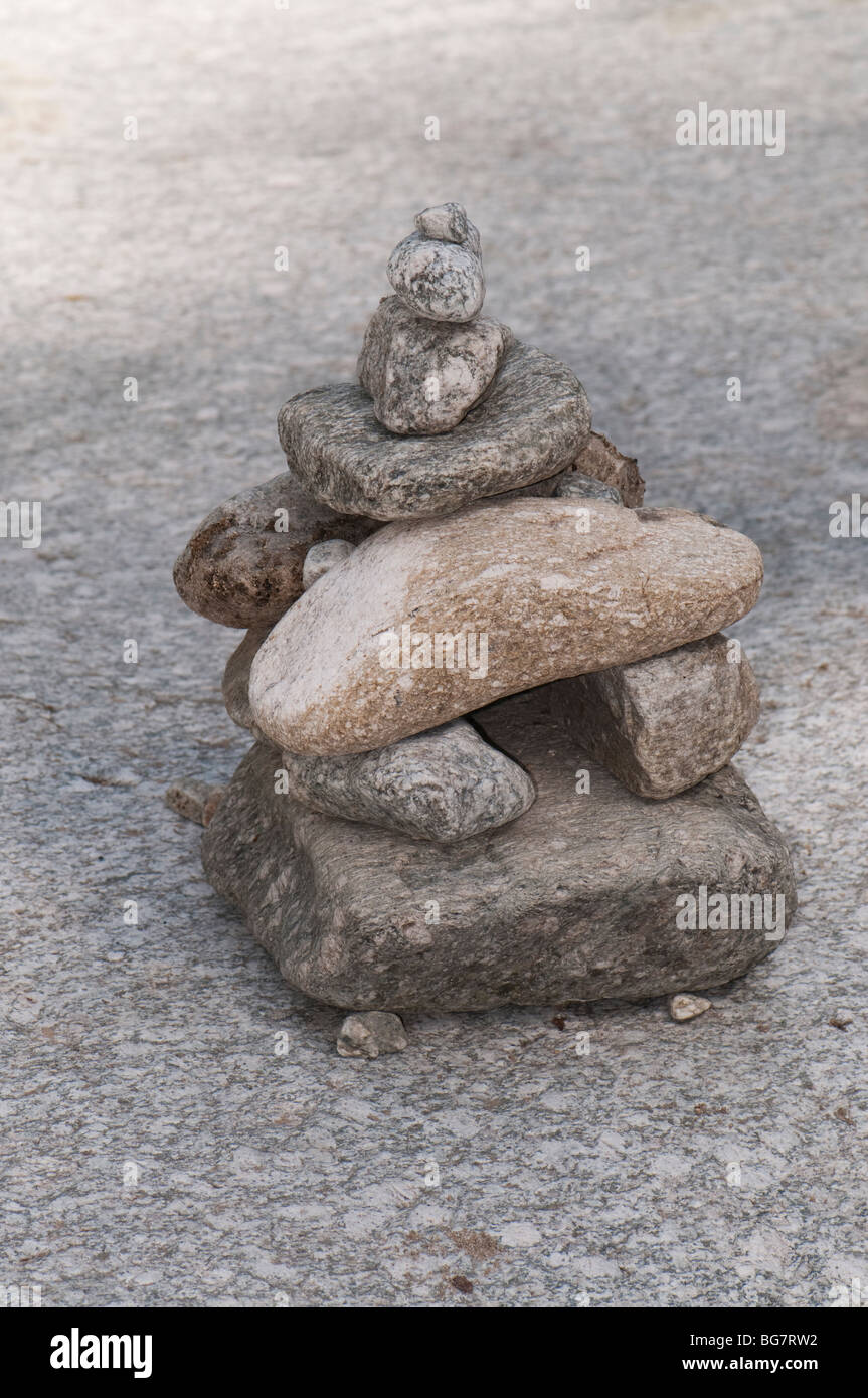 Cairn placed for signaling the correct path for mountain hikers ...
