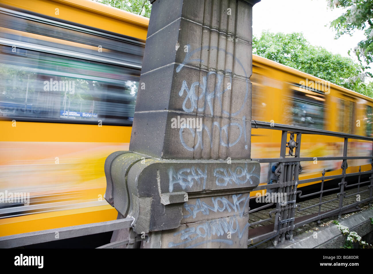 Yellow subway train in Berlin Stock Photo - Alamy