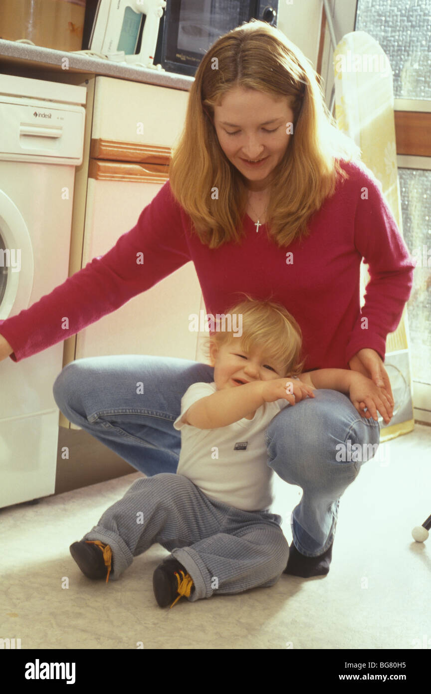 mother holding toddlerhaving a tantrum Stock Photo - Alamy