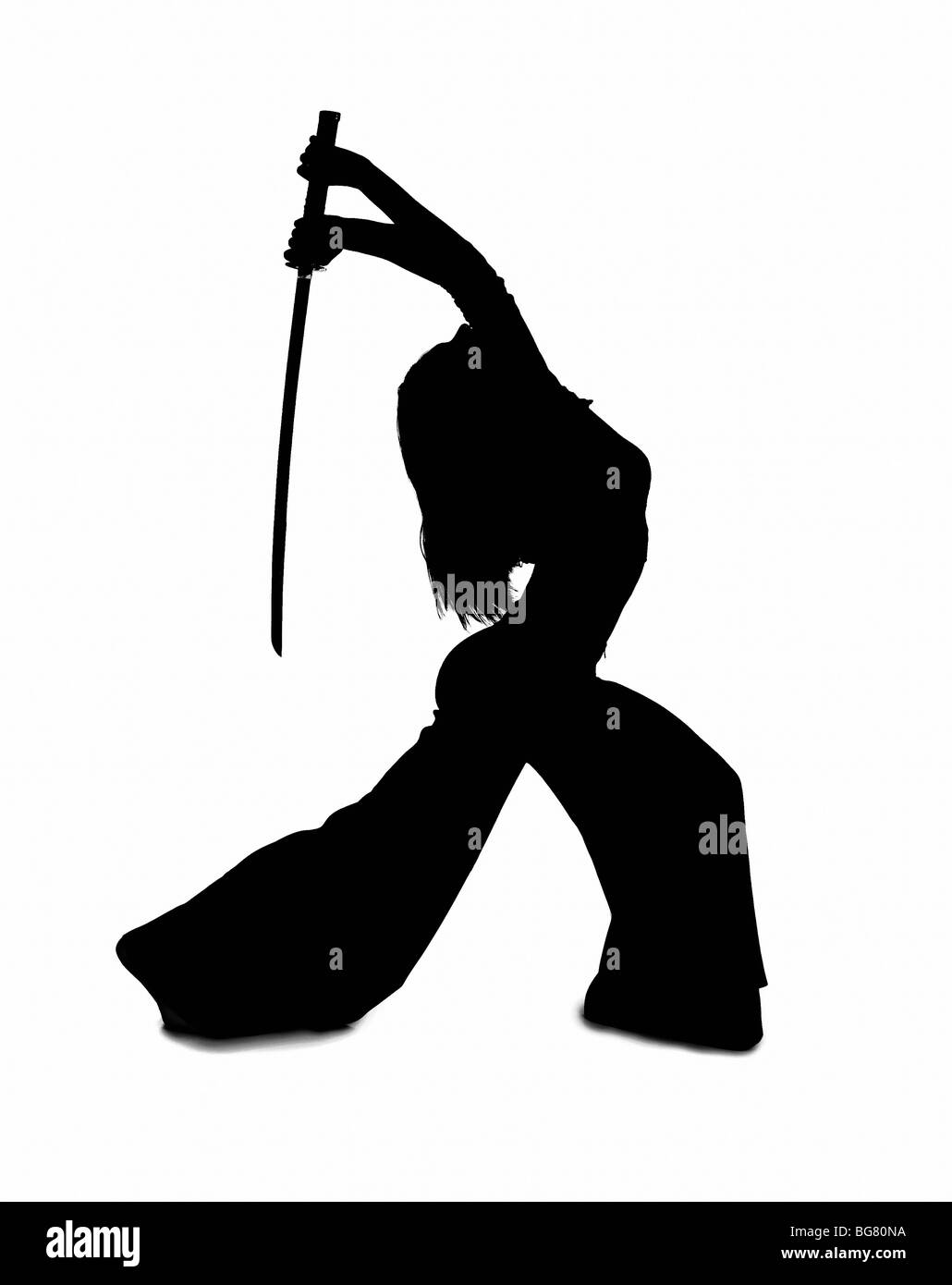 Beautiful woman in an aggressive posture with a sword on a white ...