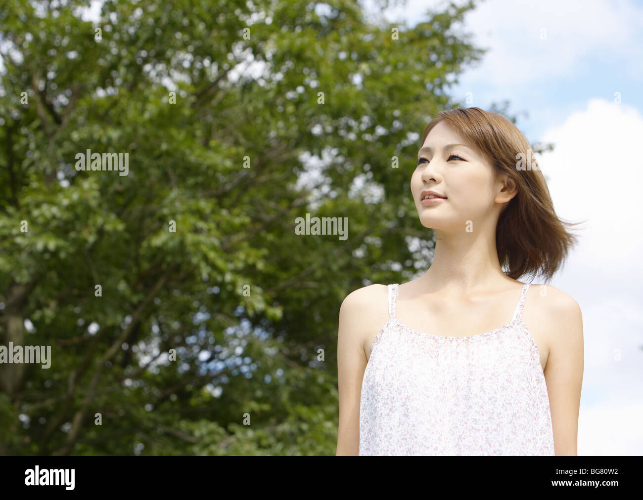 A young woman looking Stock Photo - Alamy