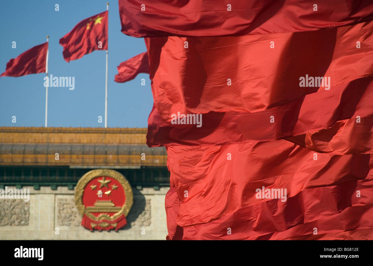 Red flags fly over the Great Hall of the People in Tiananmen Square ...
