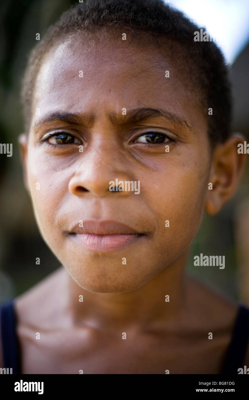 A portrait of a young girls serious face Stock Photo - Alamy