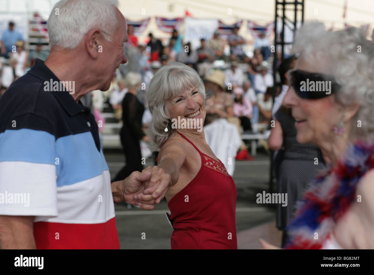 Seniors talk and laugh Stock Photo - Alamy