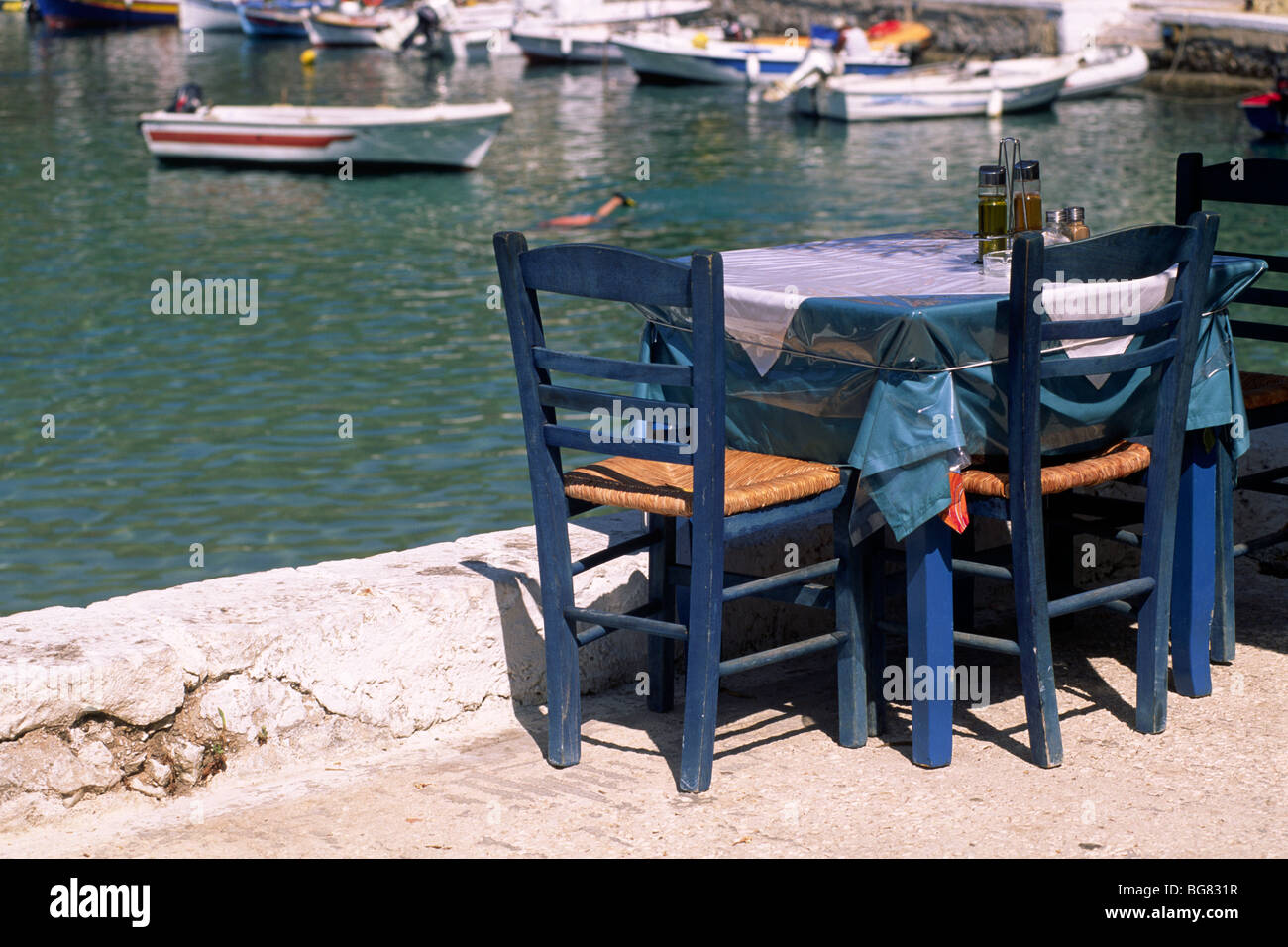 Seaside taverna tables hi-res stock photography and images - Alamy
