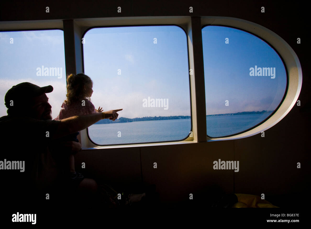 Passengers ride the high speed Cat ferry Stock Photo - Alamy
