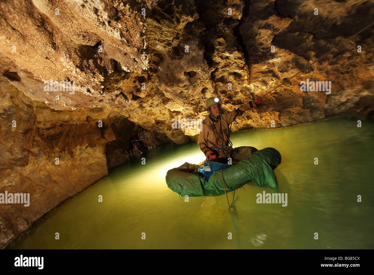 A cave explorer makes her way through a cave called 'Asopladeru la Texa ...