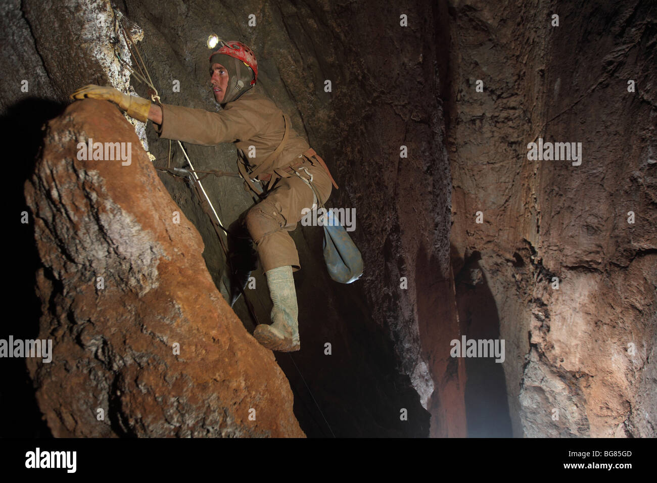 Explorer with torch in cave hi-res stock photography and images - Alamy