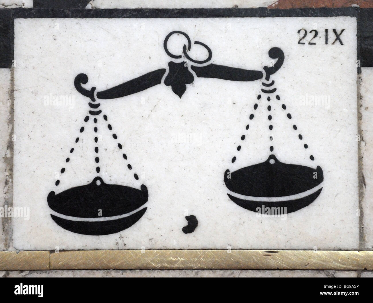 Marble stone tile showing Libra the Scales Zodiac sign on floor of il ...