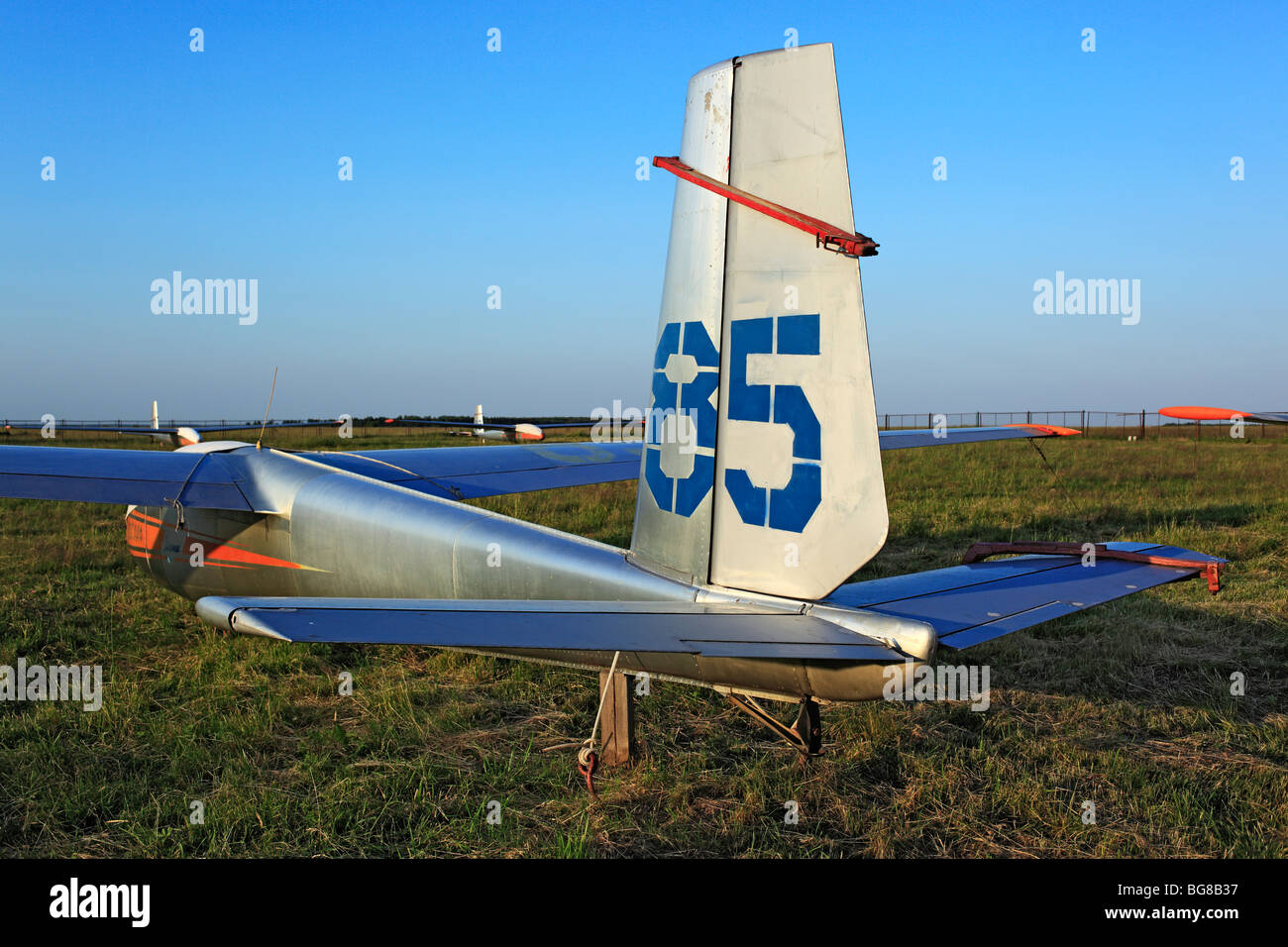 Light aircraft planes parked at a grass airfield, Russia Stock Photo ...