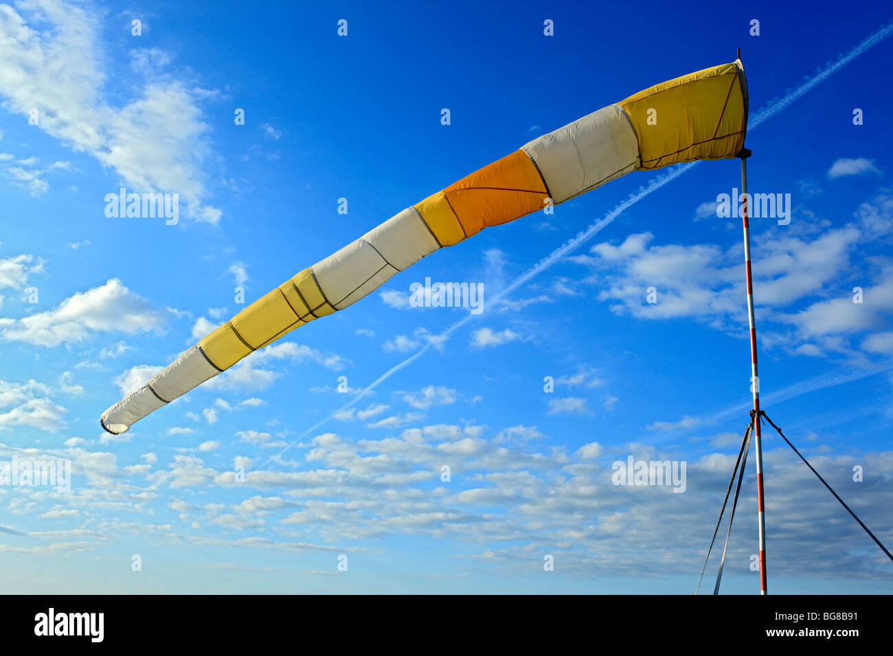 Airport windsock blowing in the breeze with a sky background Stock ...