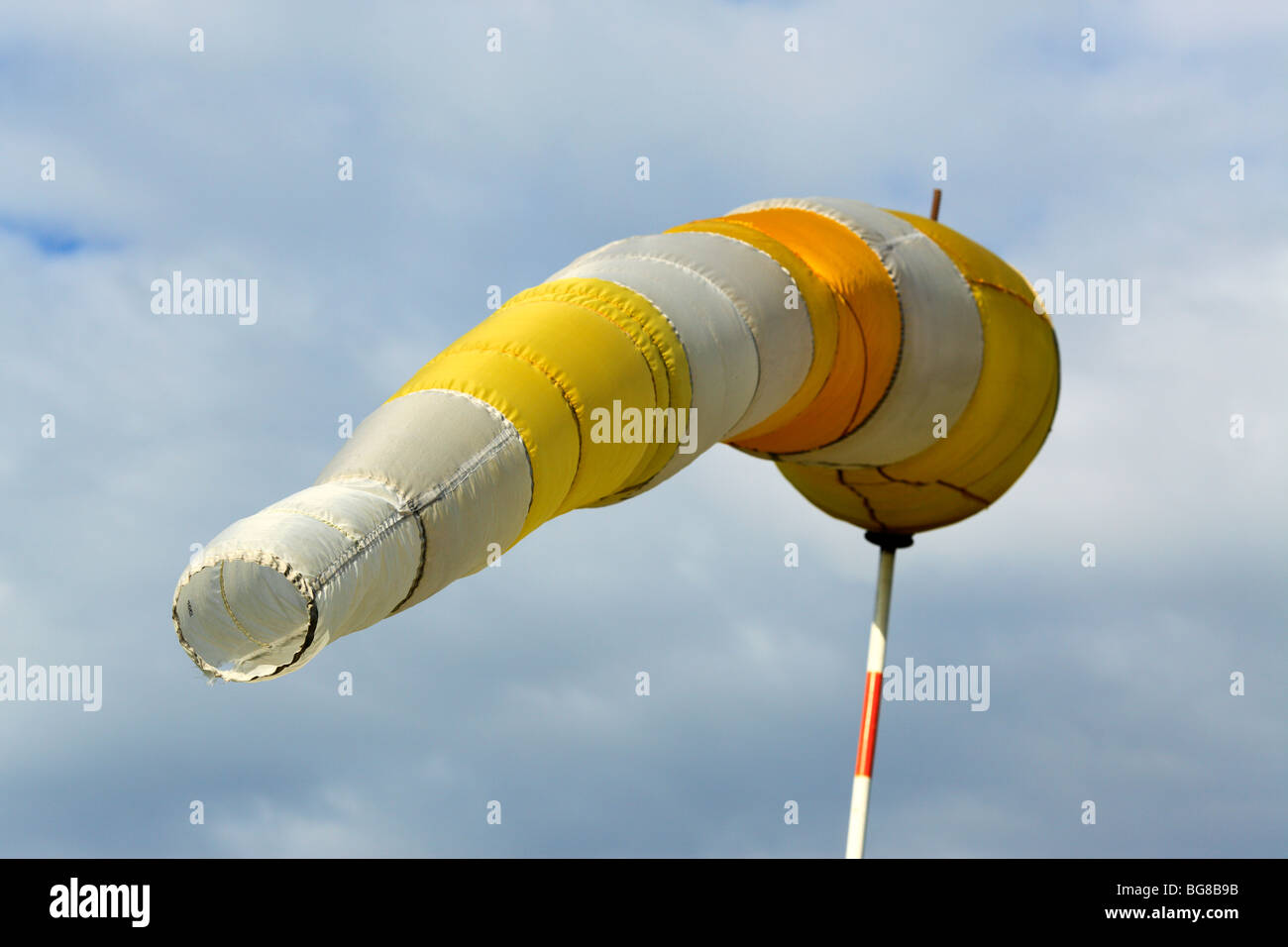 Airport windsock blowing in the breeze with a sky background Stock ...