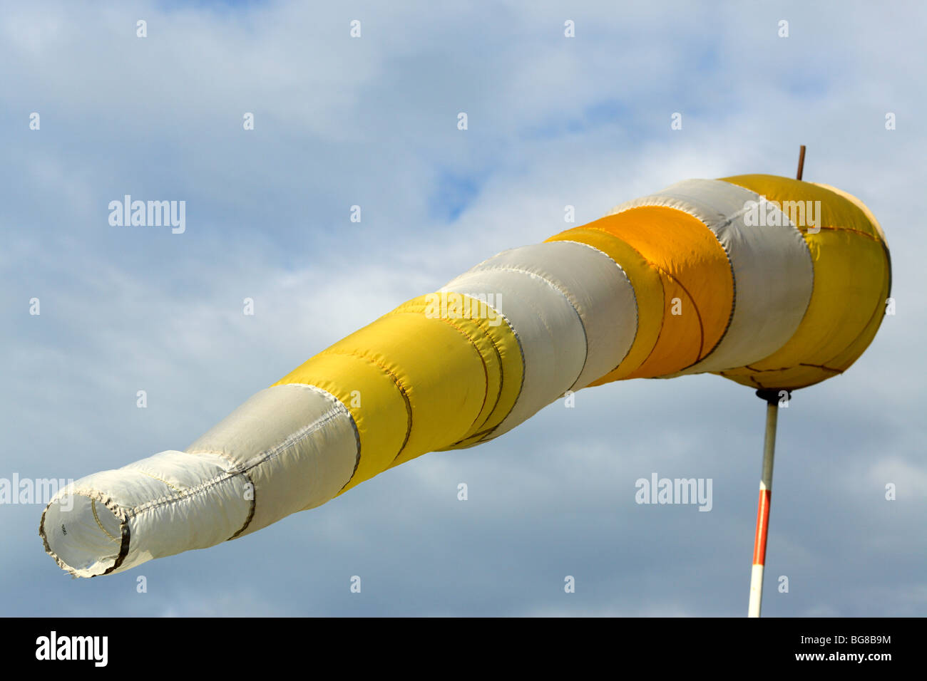Airport windsock blowing in the breeze with a sky background Stock ...