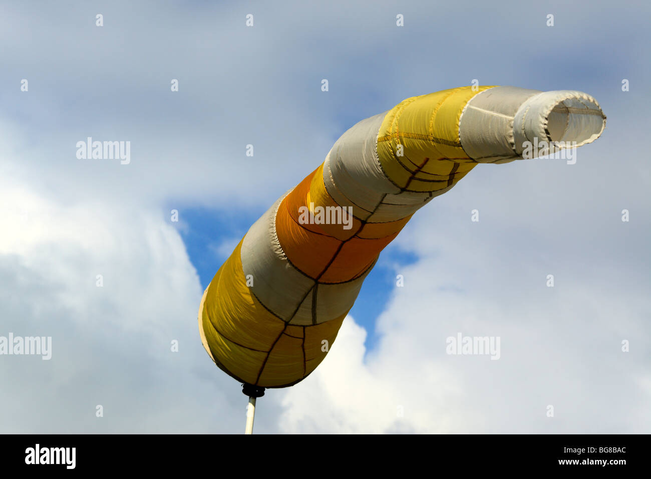 Windsock cloudy sky in background hi-res stock photography and images ...