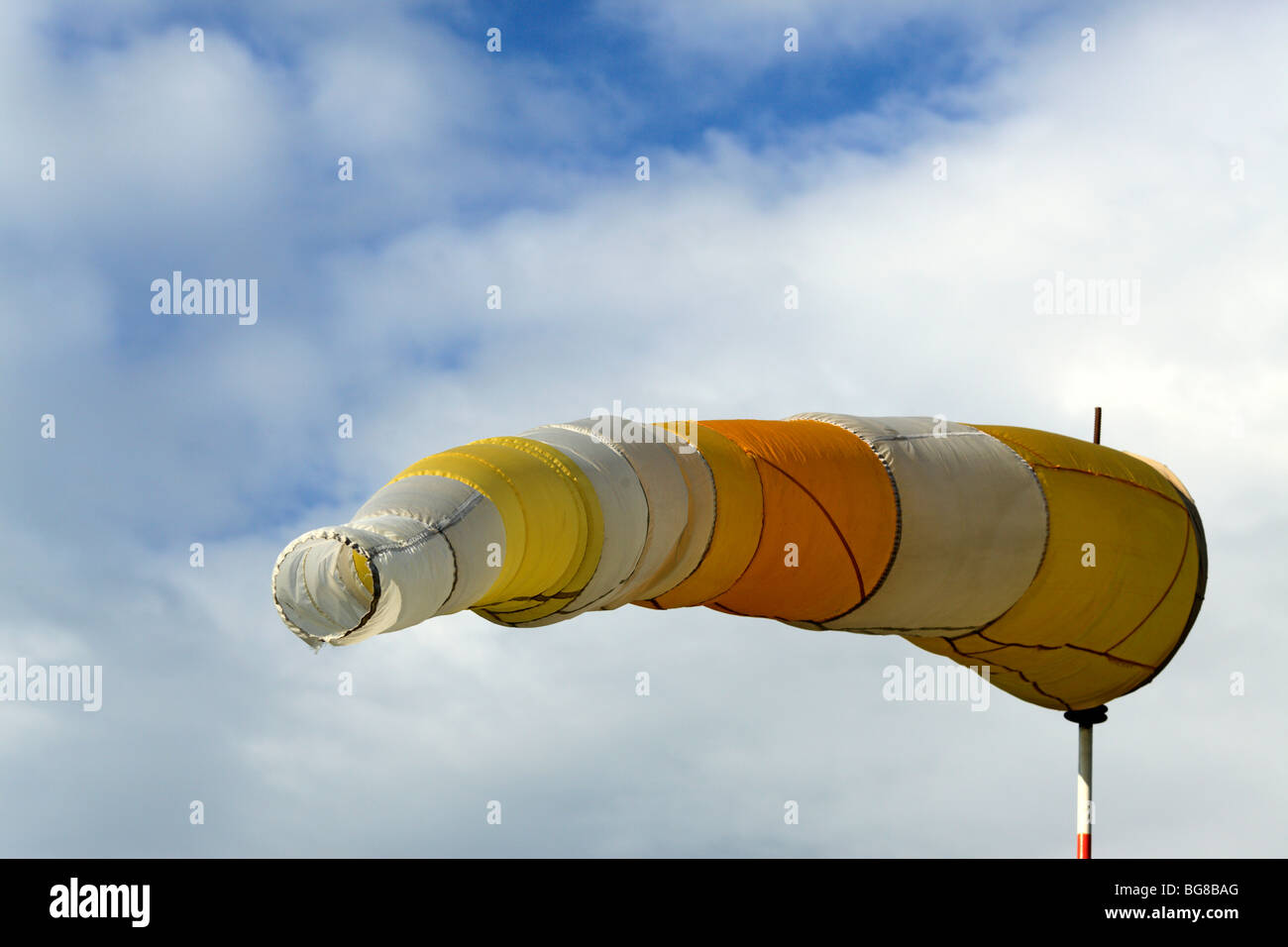 Airport windsock blowing in the breeze with a sky background Stock ...