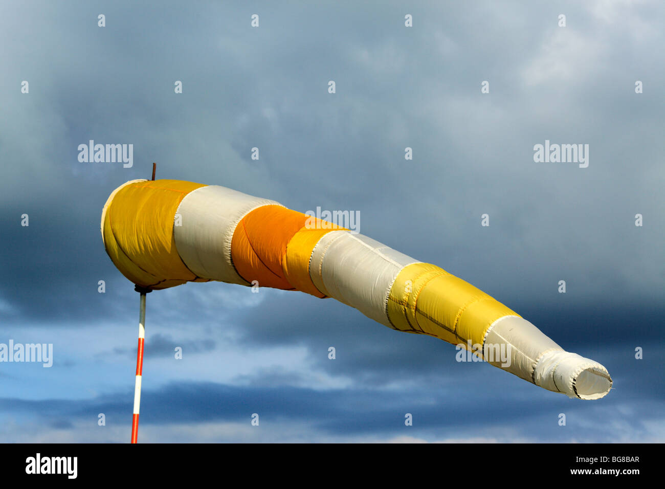 Airport windsock blowing in the breeze with a sky background Stock ...