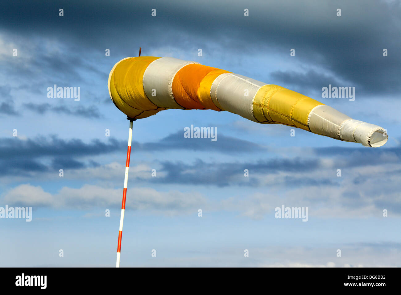 Airport windsock blowing in the breeze with a sky background Stock ...