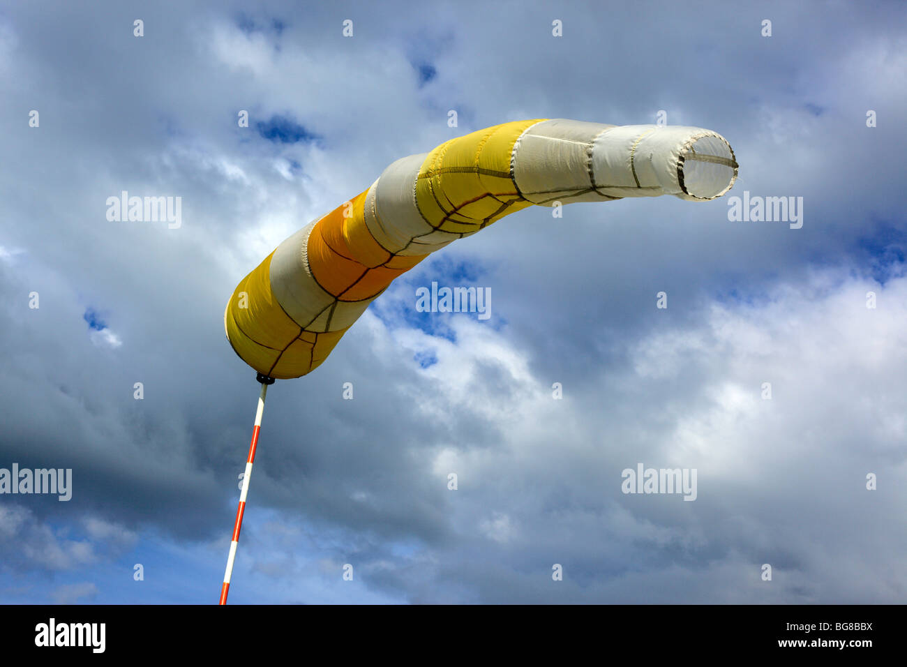 Windsock cloudy sky in background hi-res stock photography and images ...
