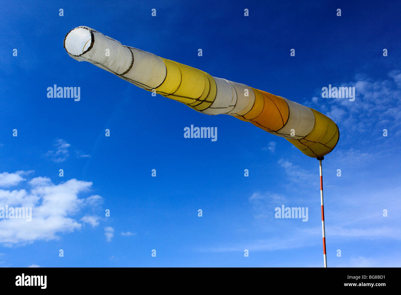 Airport windsock blowing in the breeze with a sky background Stock ...