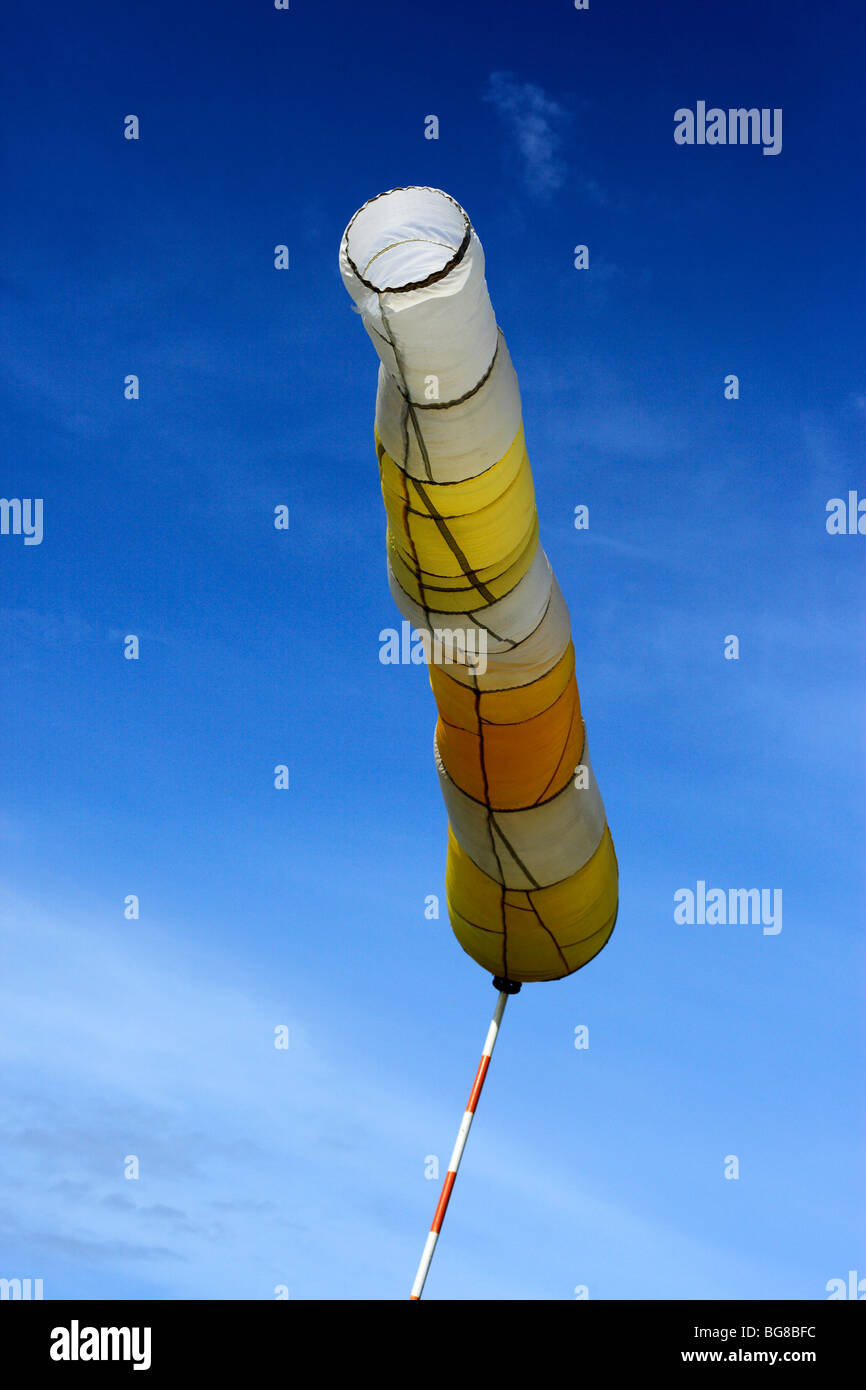 Airport windsock blowing in the breeze with a sky background Stock ...