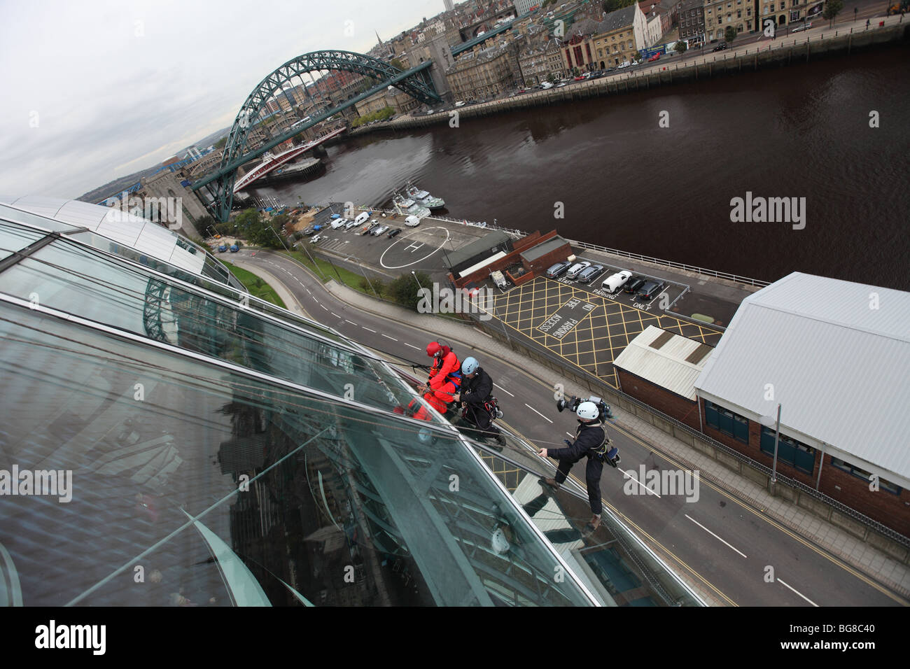 BBC 'Blue Peter' presenter Joel Defries window cleaning for the program ...