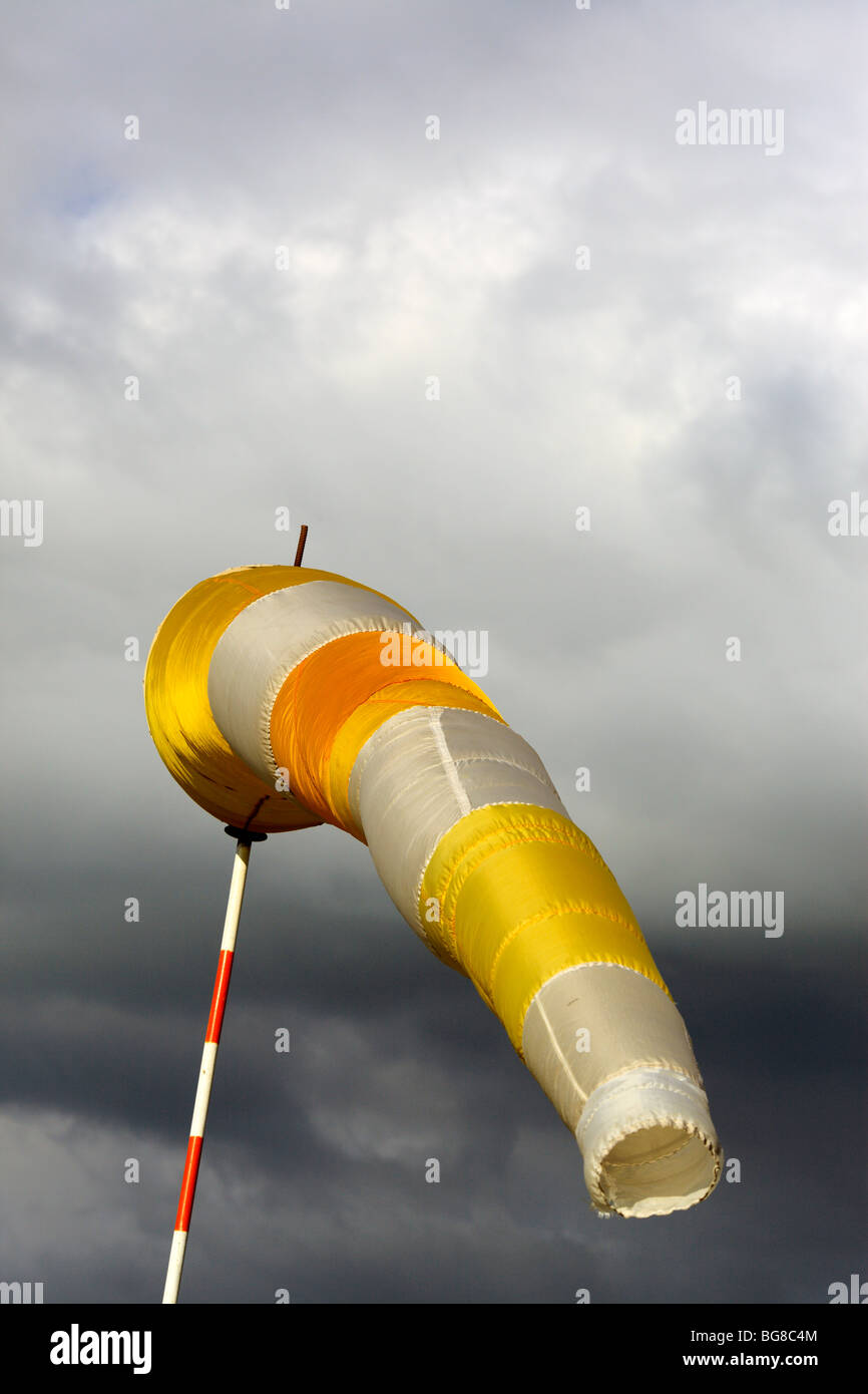 Airport windsock blowing in the breeze with a sky background Stock ...