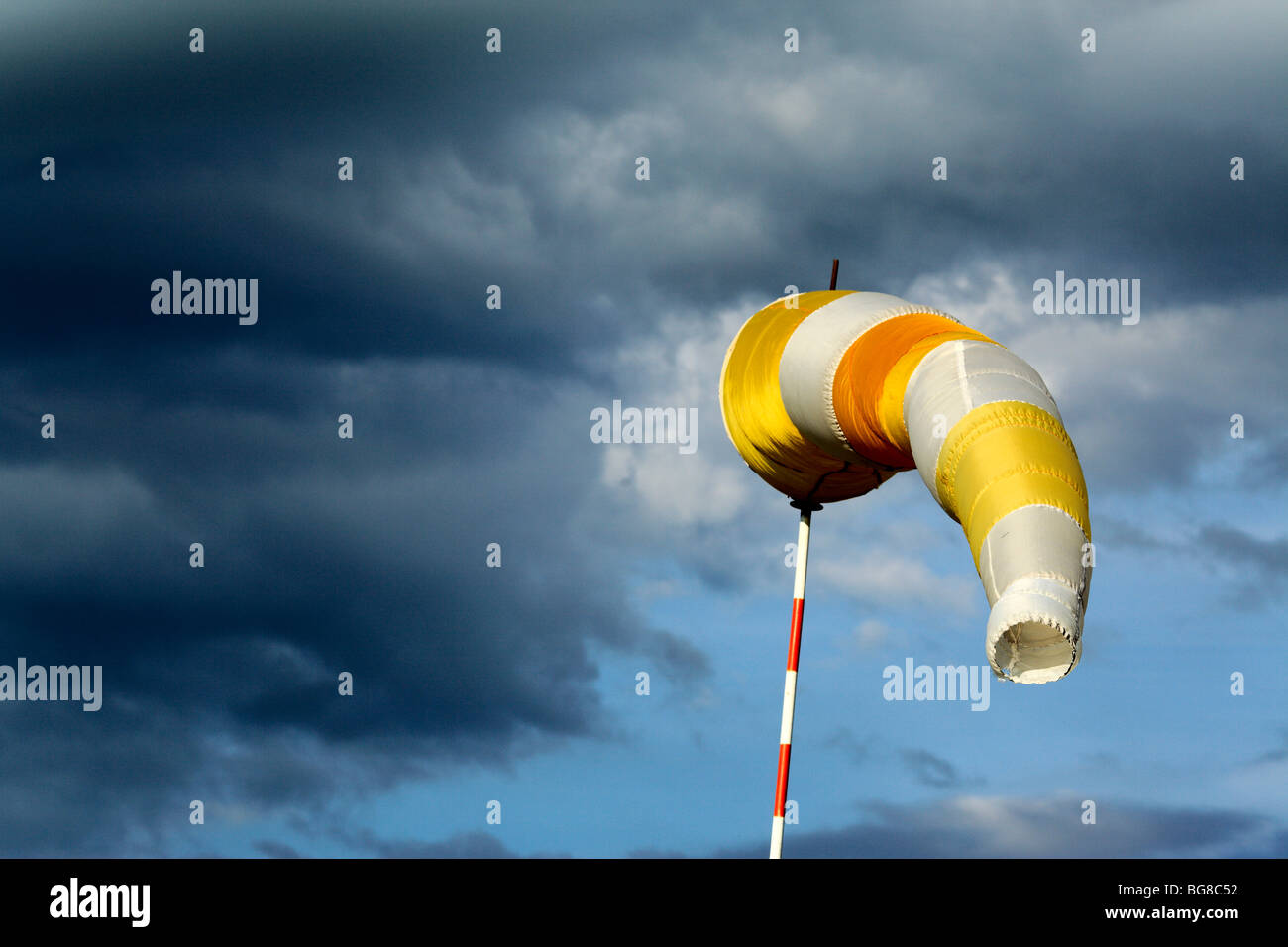 Airport windsock blowing in the breeze with a sky background Stock ...