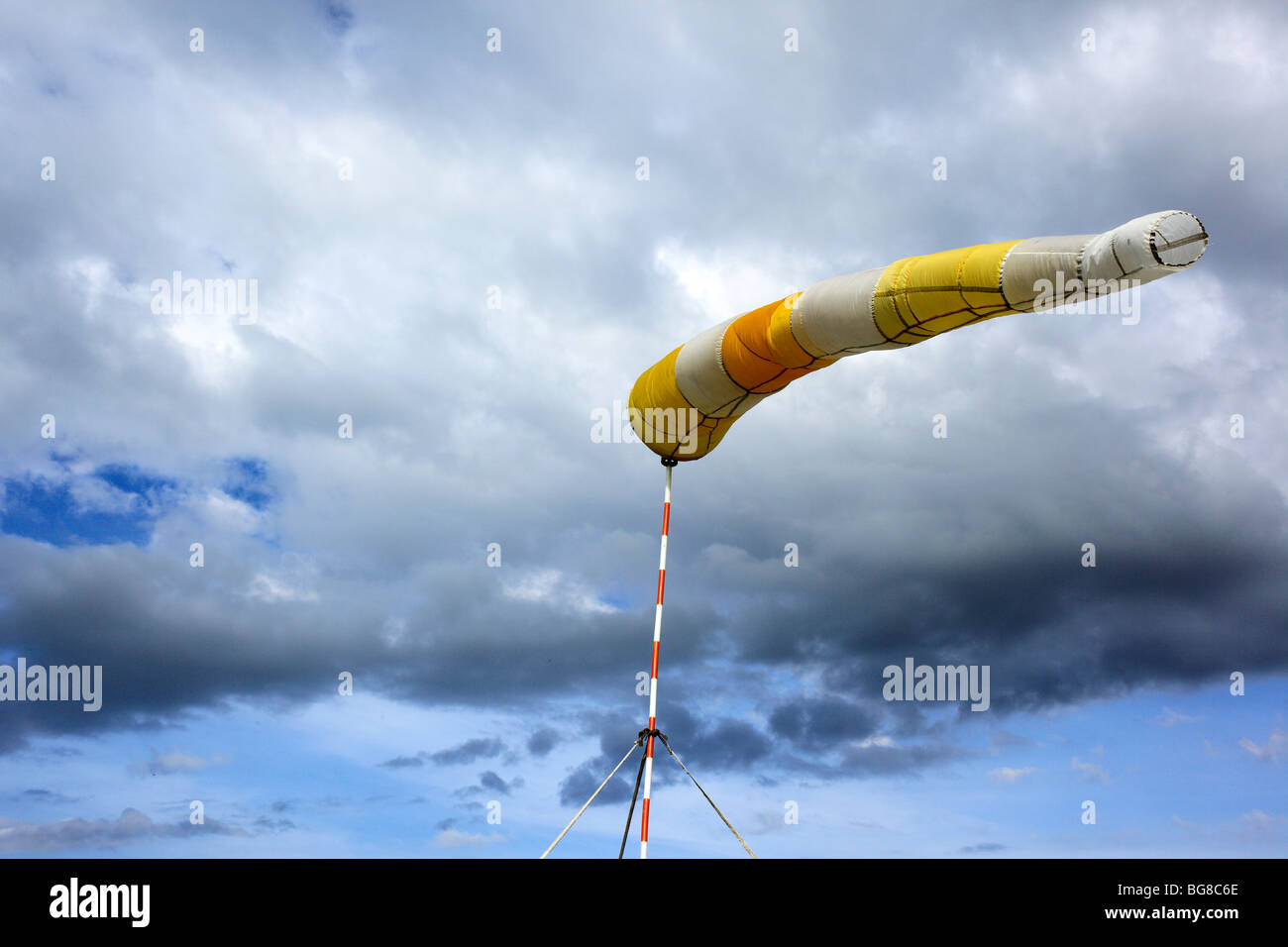 Airport windsock blowing in the breeze with a sky background Stock ...