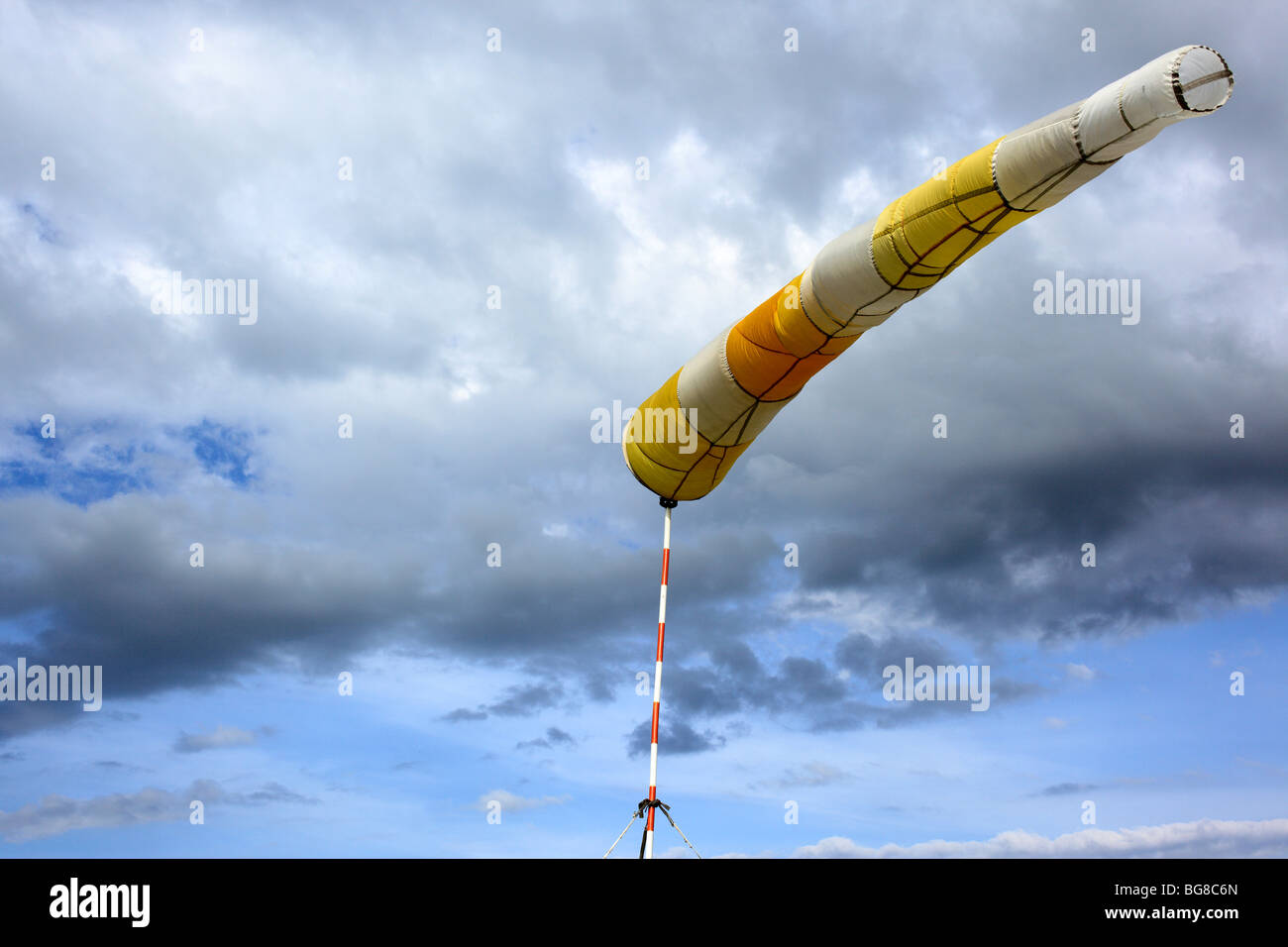 Airport windsock blowing in the breeze with a sky background Stock ...