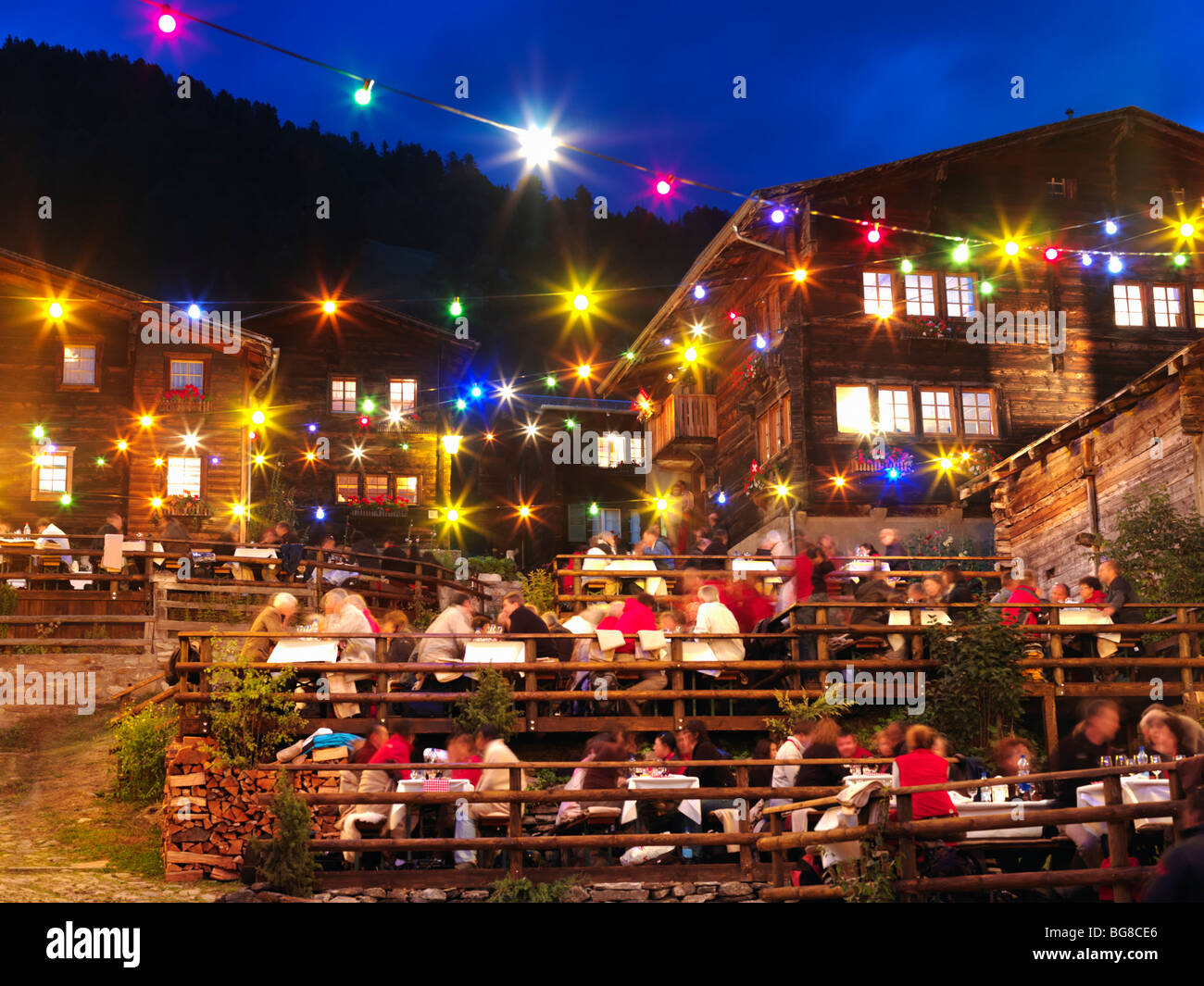 Switzerland, Binn,people enjoying an open air dining experience in the ...