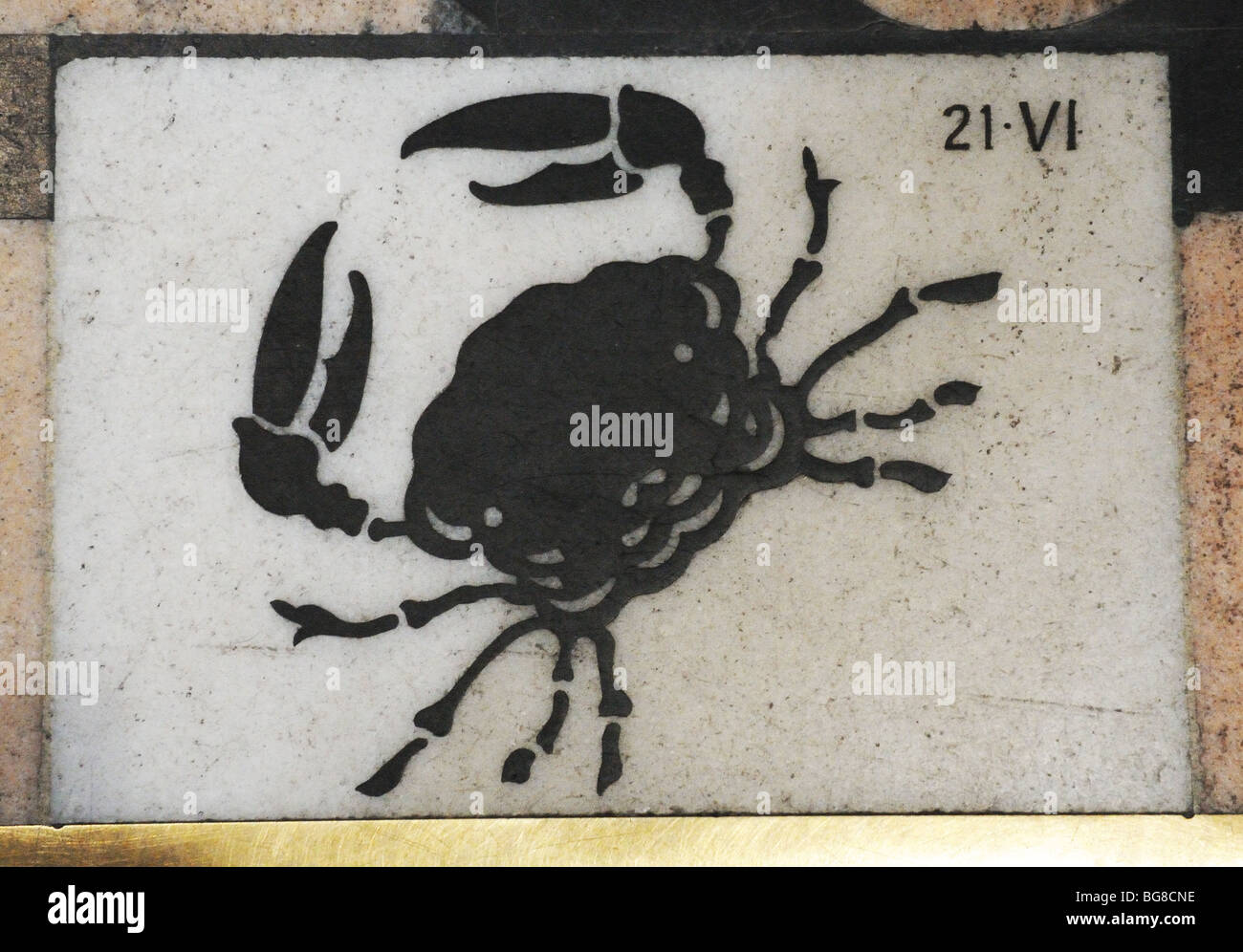 Marble stone tile showing Cancer the Crab Zodiac sign on floor of il ...