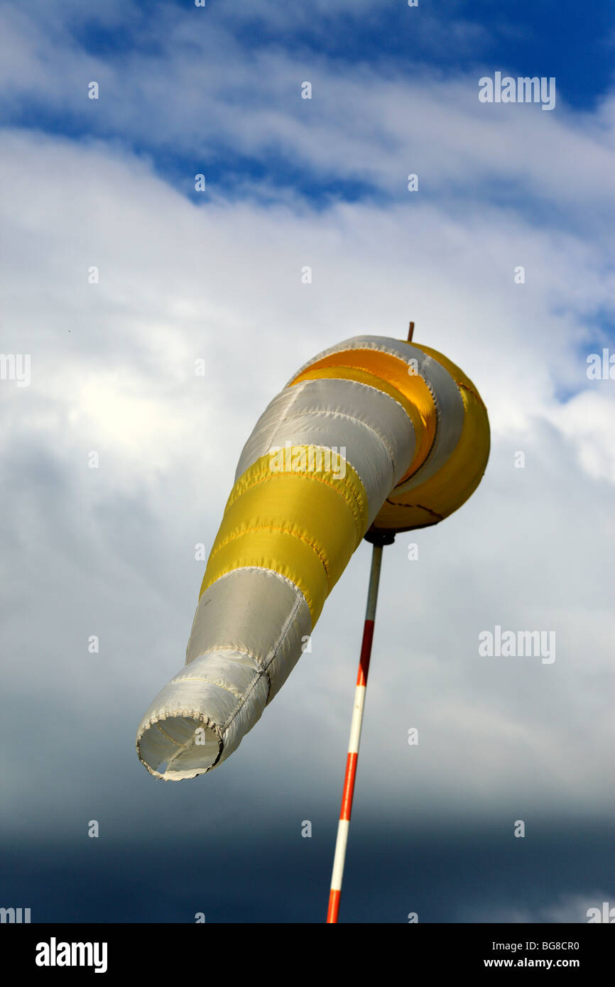 Airport windsock blowing in the breeze with a sky background Stock ...