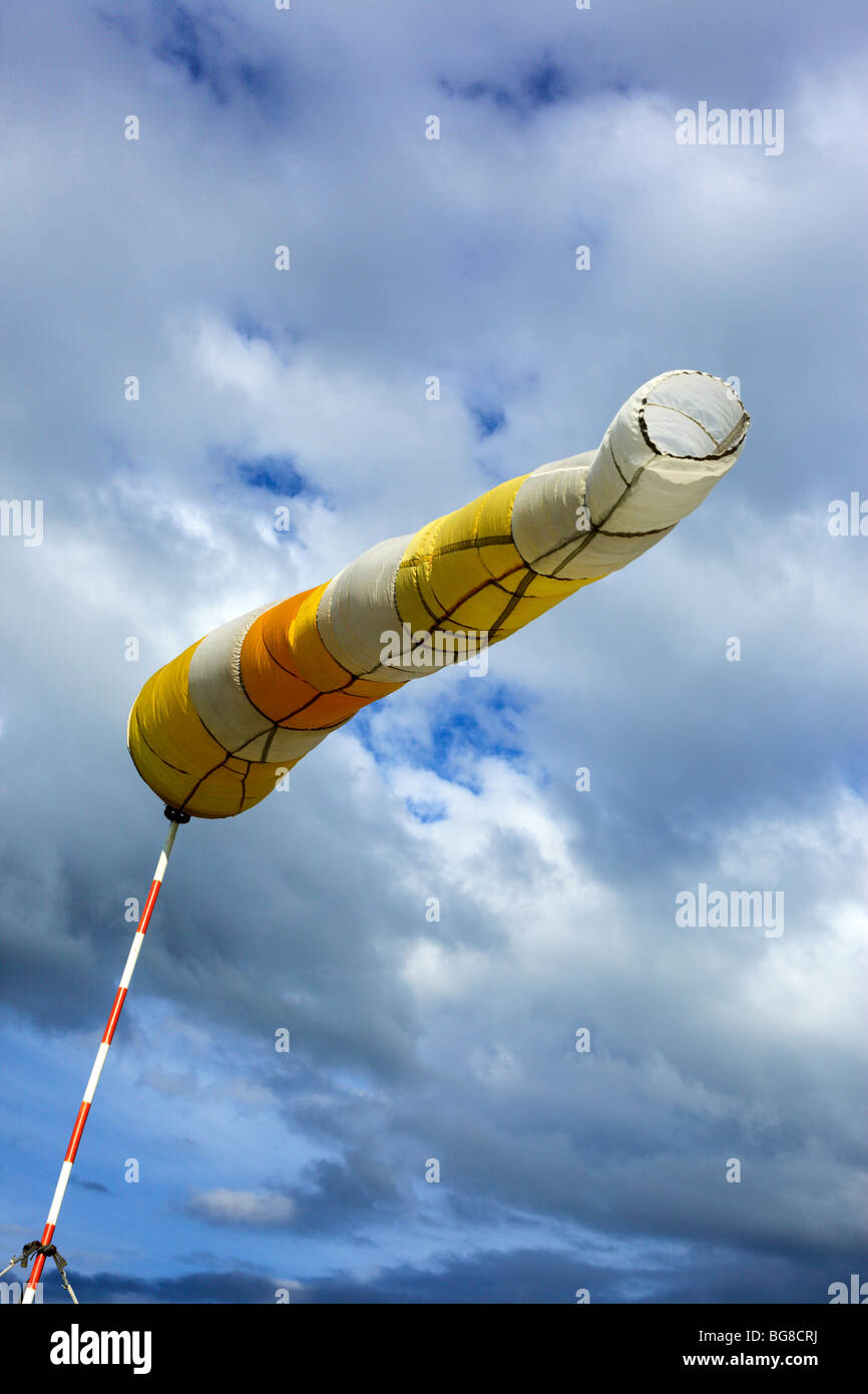 Airport windsock blowing in the breeze with a sky background Stock ...