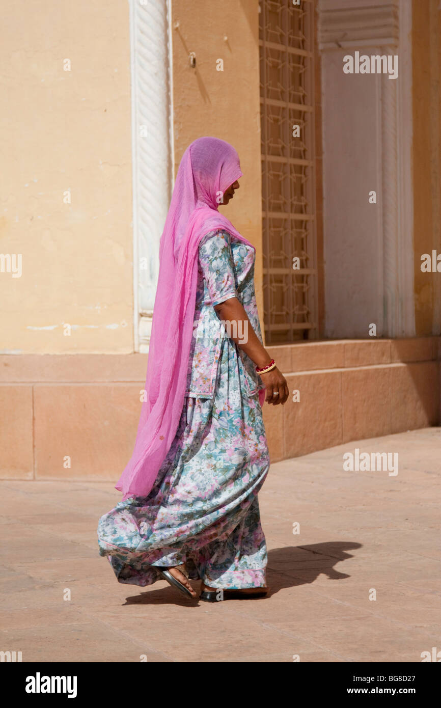 Indian woman walking Stock Photo - Alamy