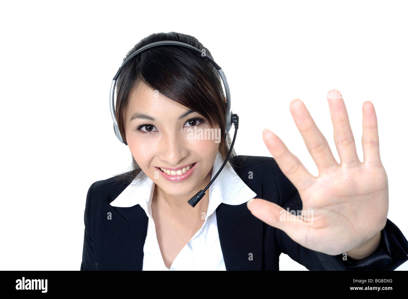 Portrait of a female customer care executive showing stop sign Stock ... Portrait of a female customer care executive showing stop sign Stock ...
