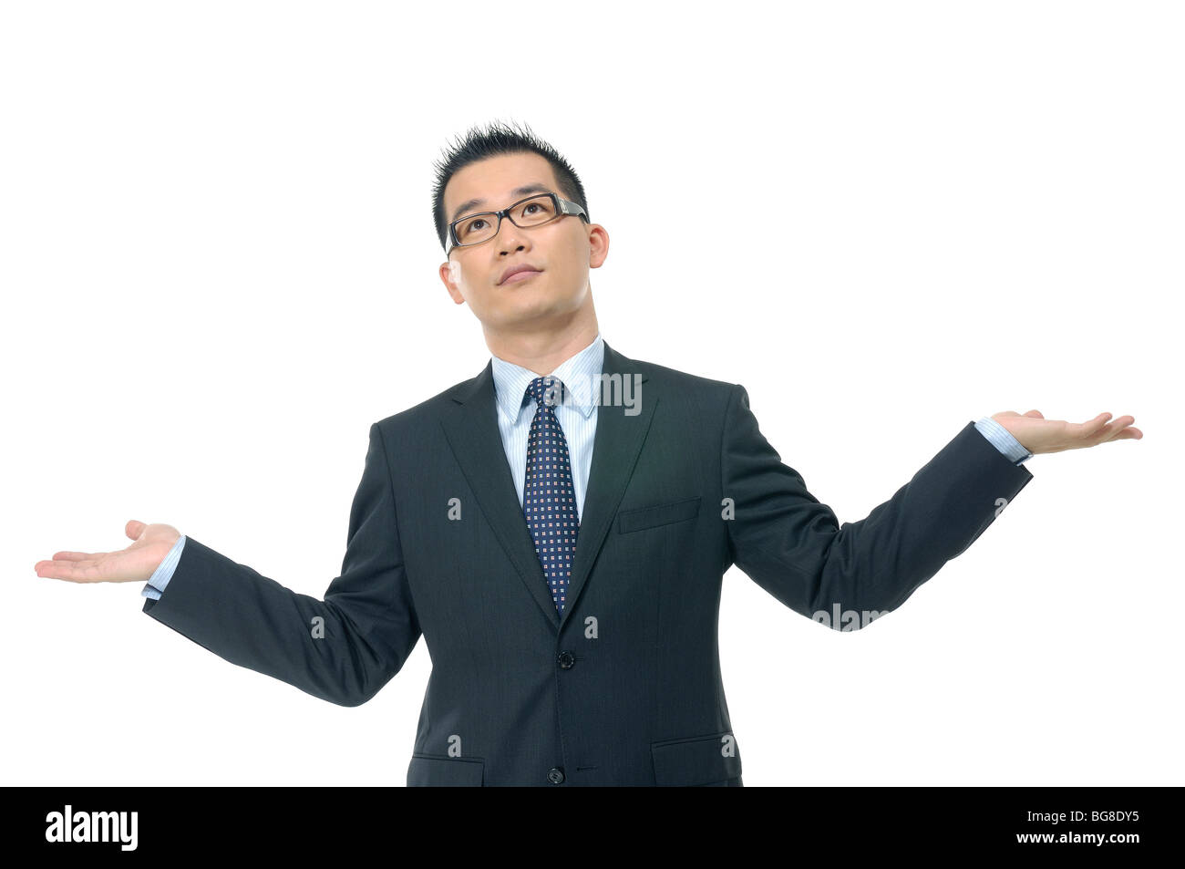 Young asian man shrugging hi-res stock photography and images - Alamy